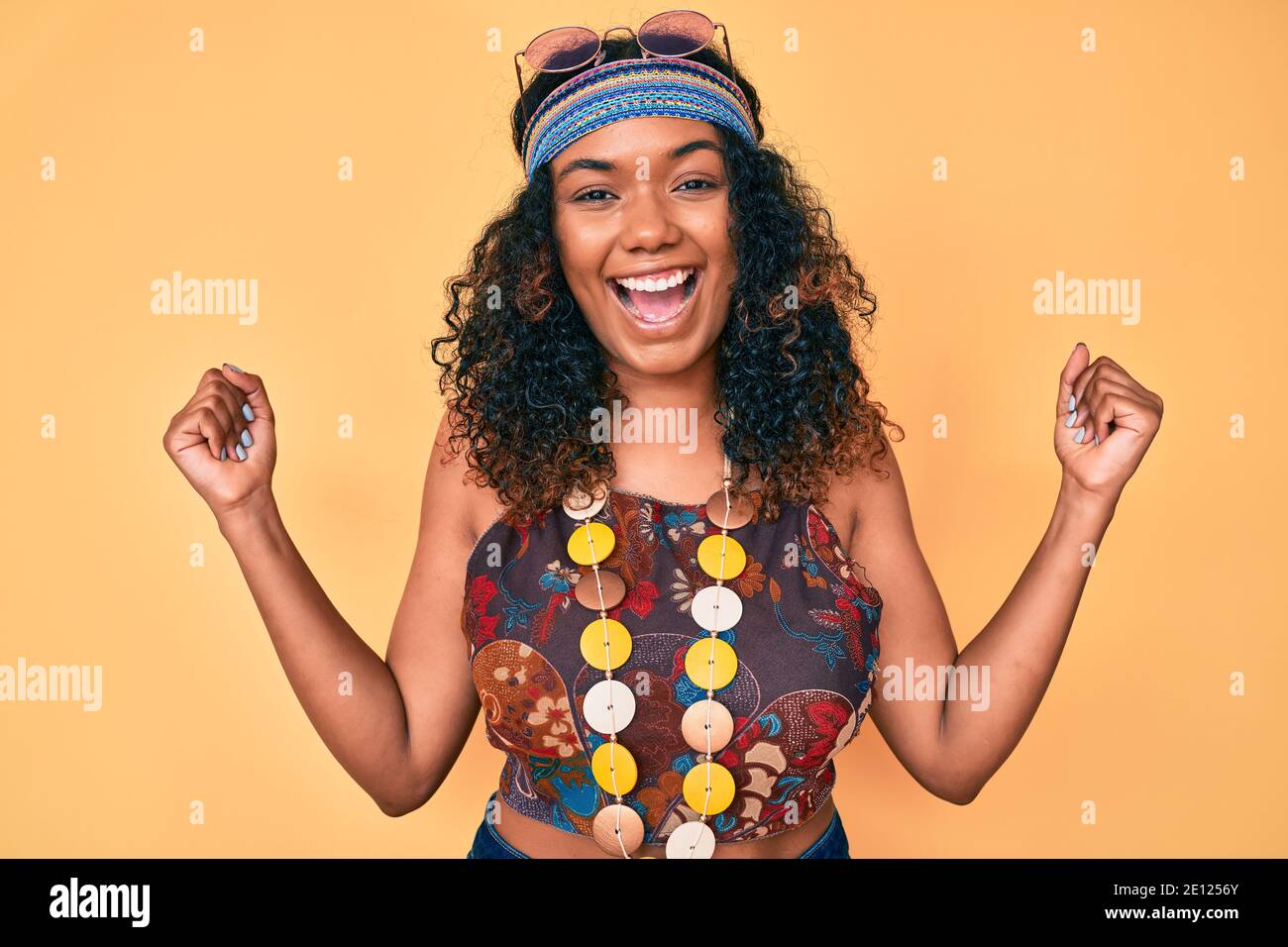 Young african american woman wearing bohemian and hippie style ...