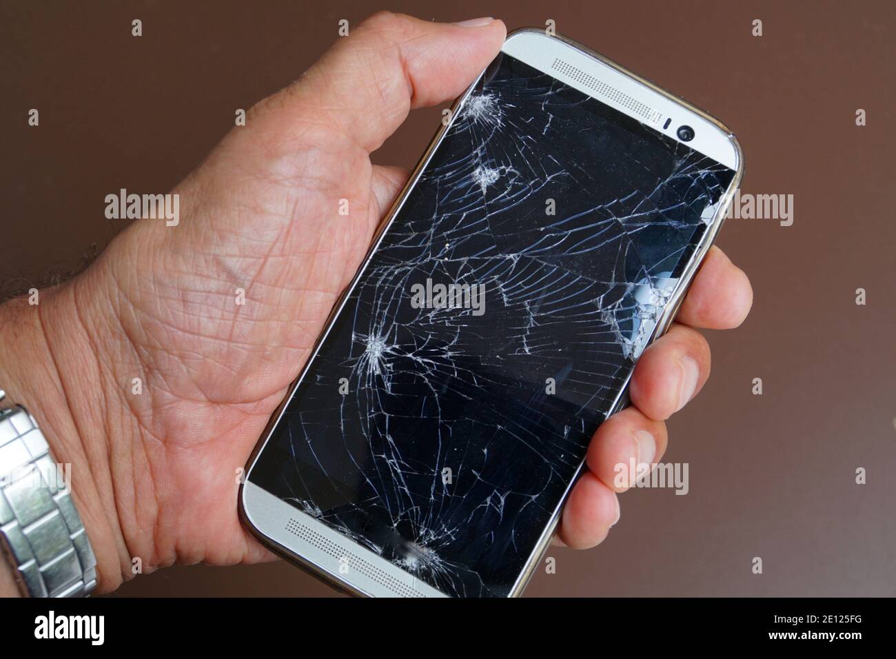 Smartphone With Broken Glass Stock Photo - Alamy