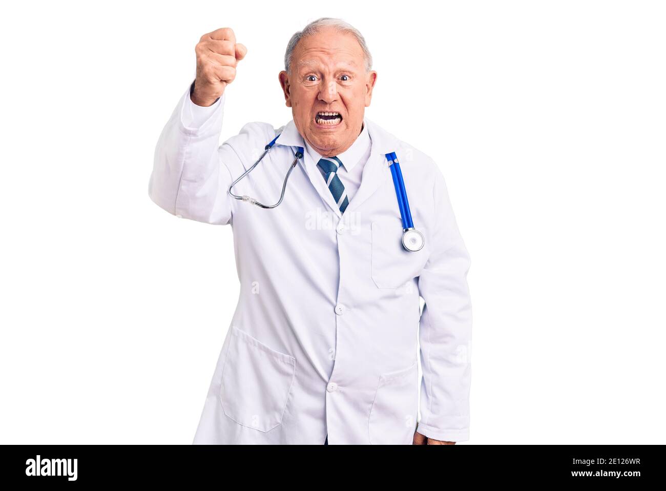 Senior handsome grey-haired man wearing doctor coat and stethoscope ...
