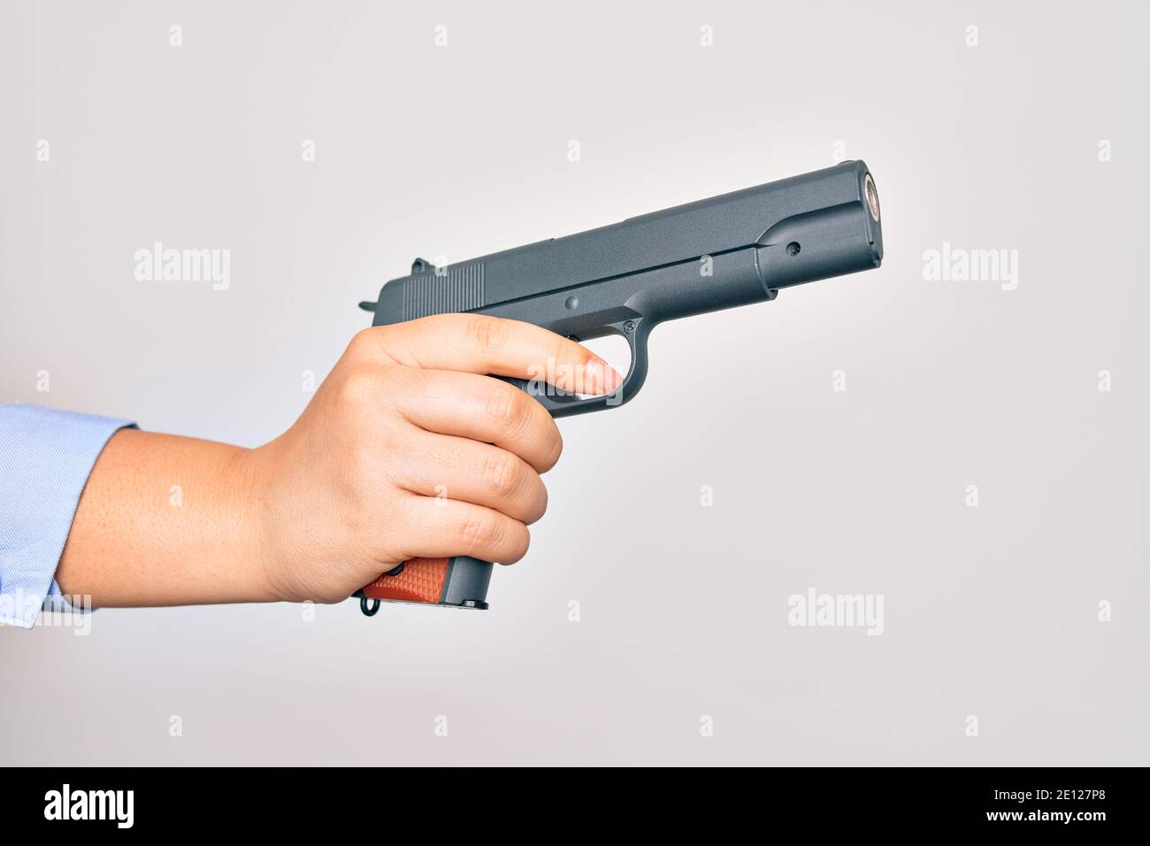 Female hand holding revolver isolated hi-res stock photography and ...