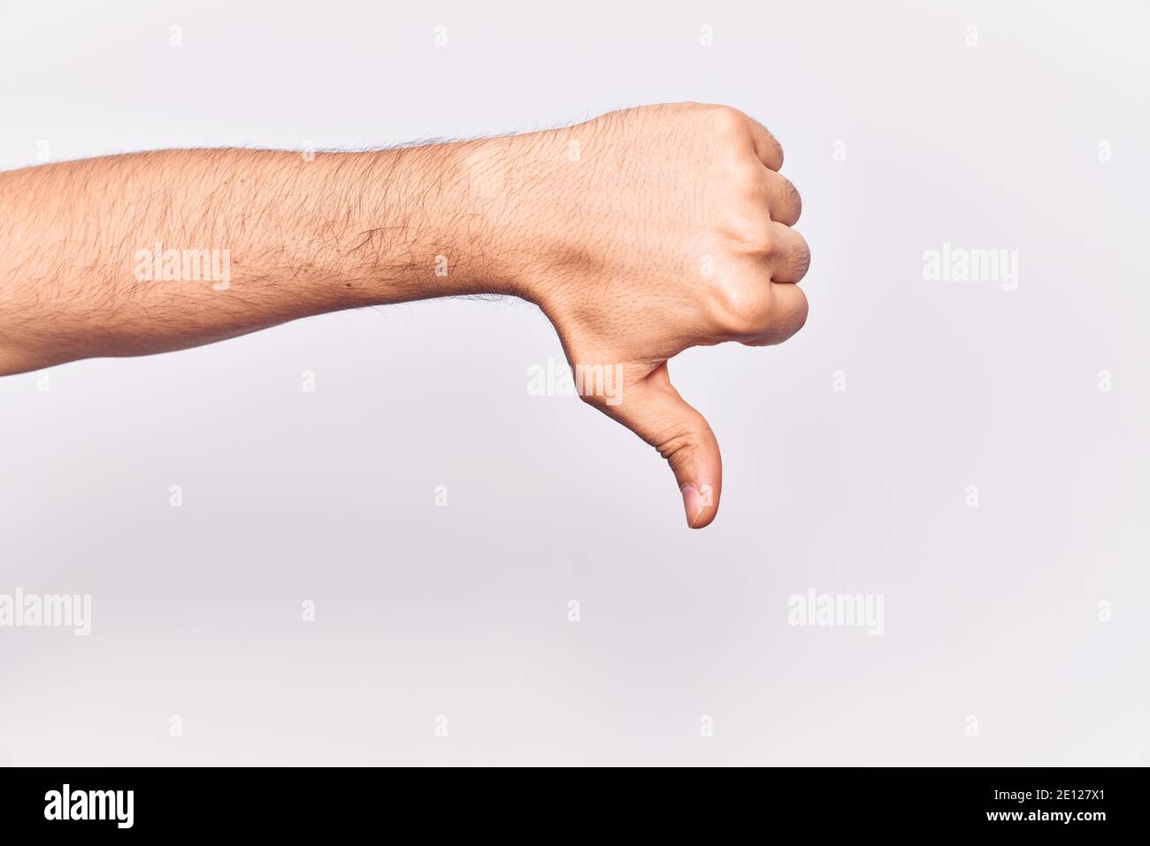 Close up of hand of young caucasian man over isolated background doing ...