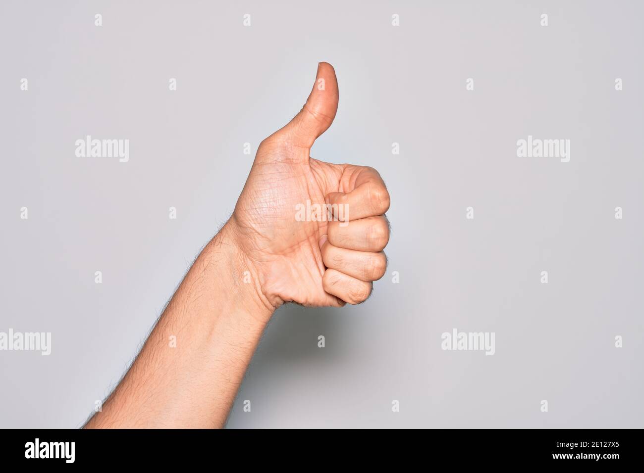 Hand of caucasian young man showing fingers over isolated white ...