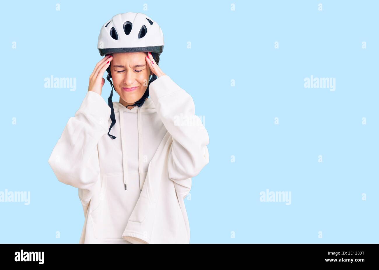 Woman wearing helmet stress hi-res stock photography and images - Alamy