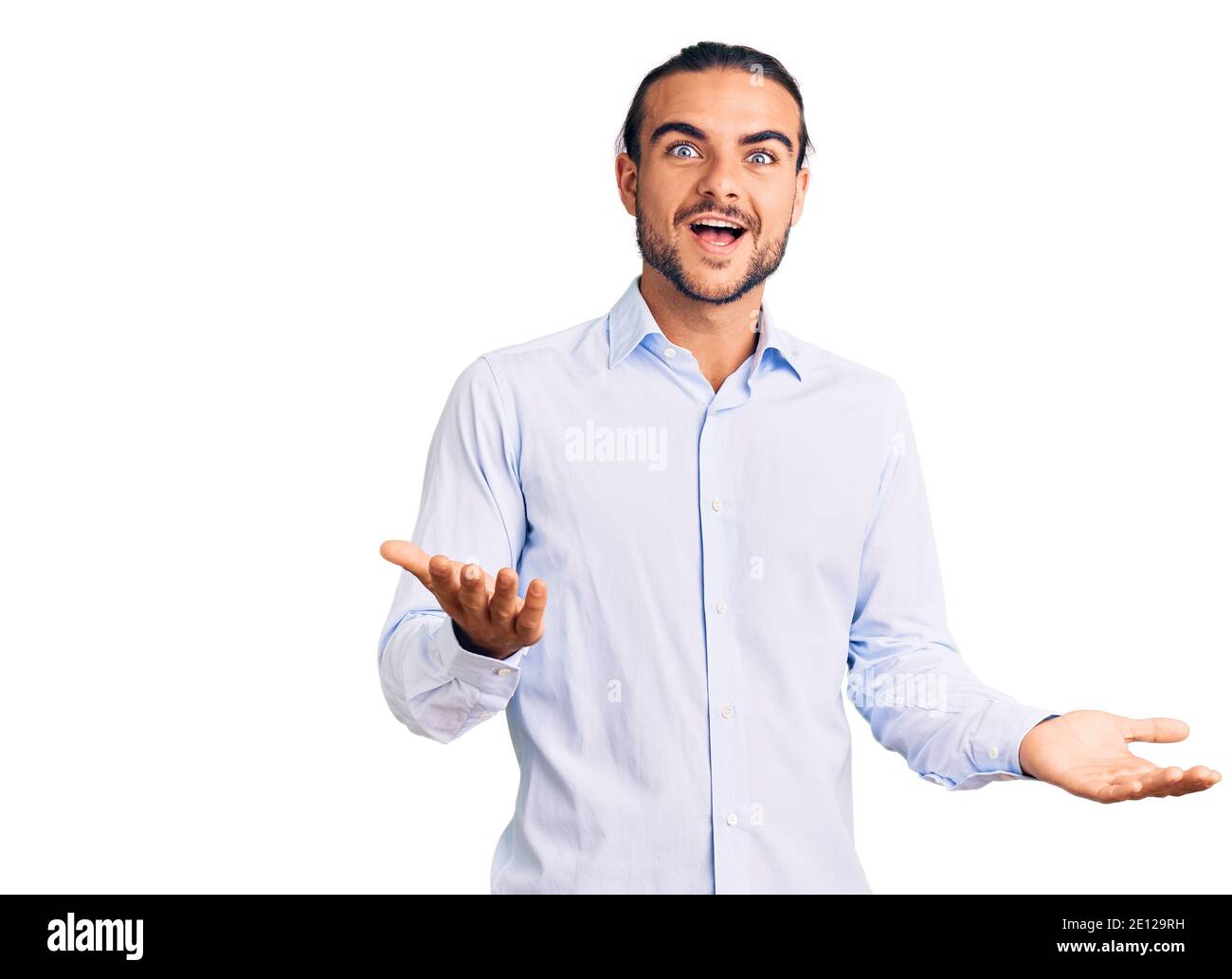 Young handsome man wearing business clothes smiling cheerful with open ...