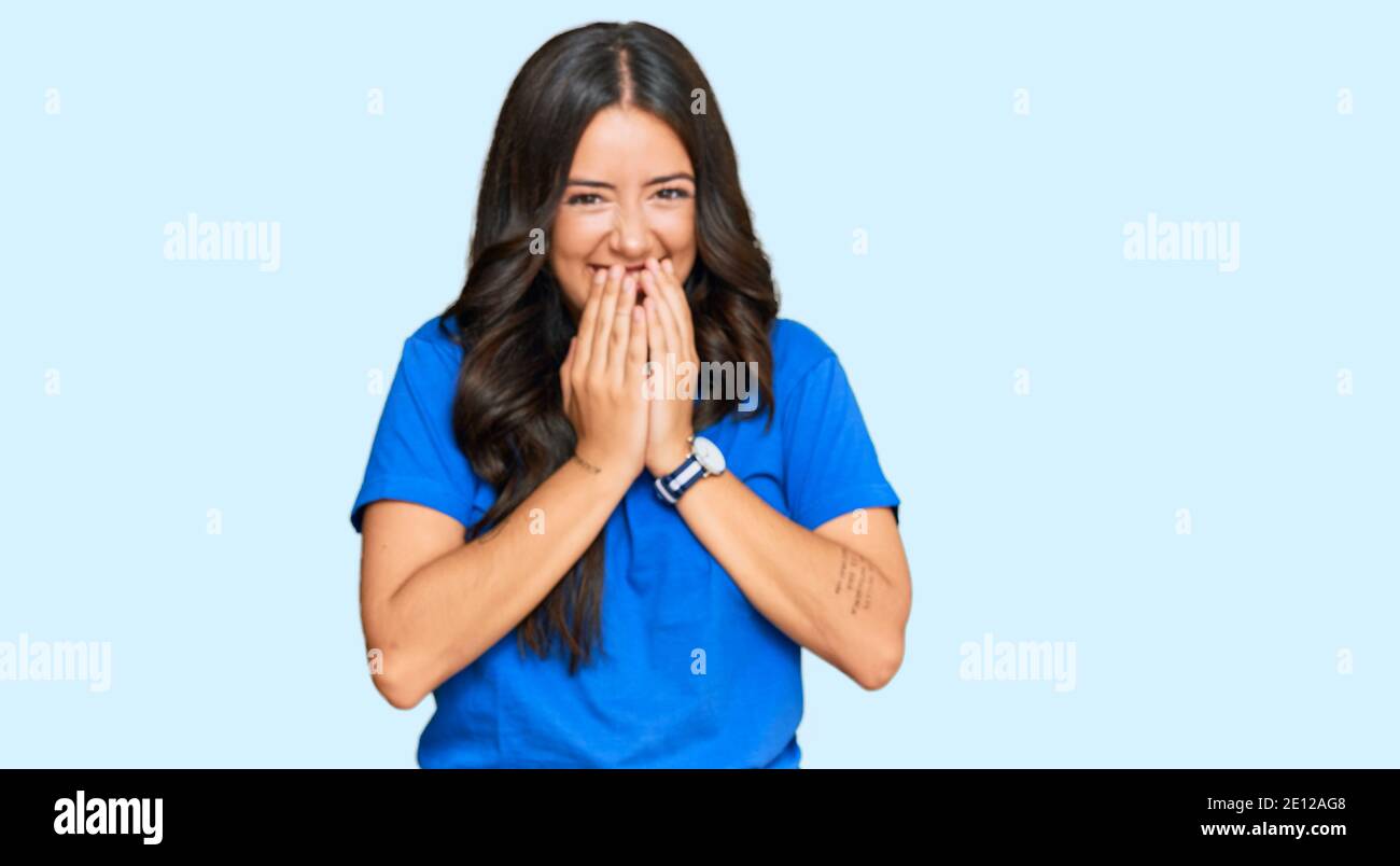 Beautiful brunette young woman wearing casual clothes laughing and ...