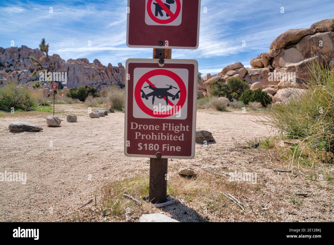 Drone Flight prohibited sign against desert rocks in Joshua Tree ...