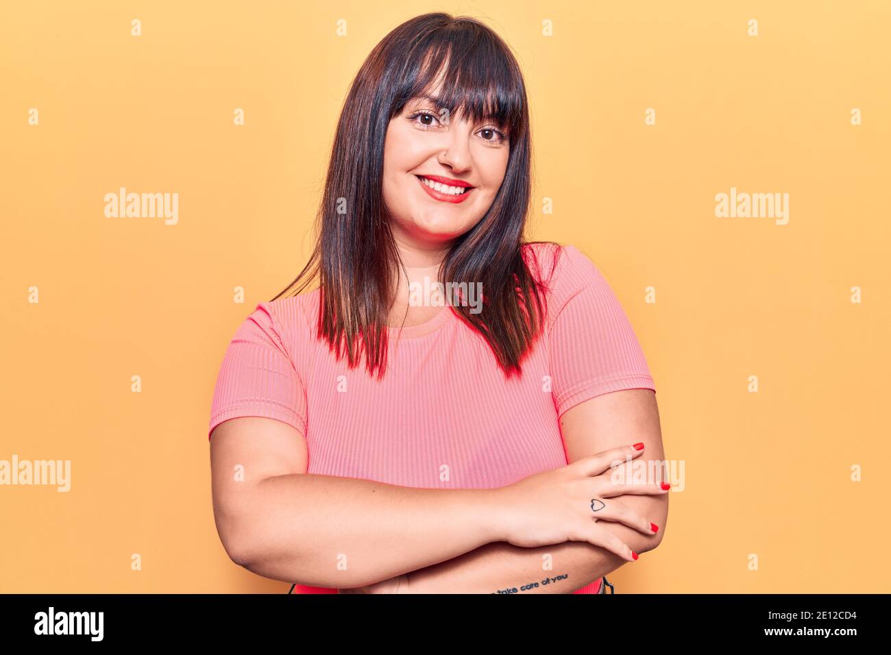 Young plus size woman wearing casual clothes happy face smiling with ...