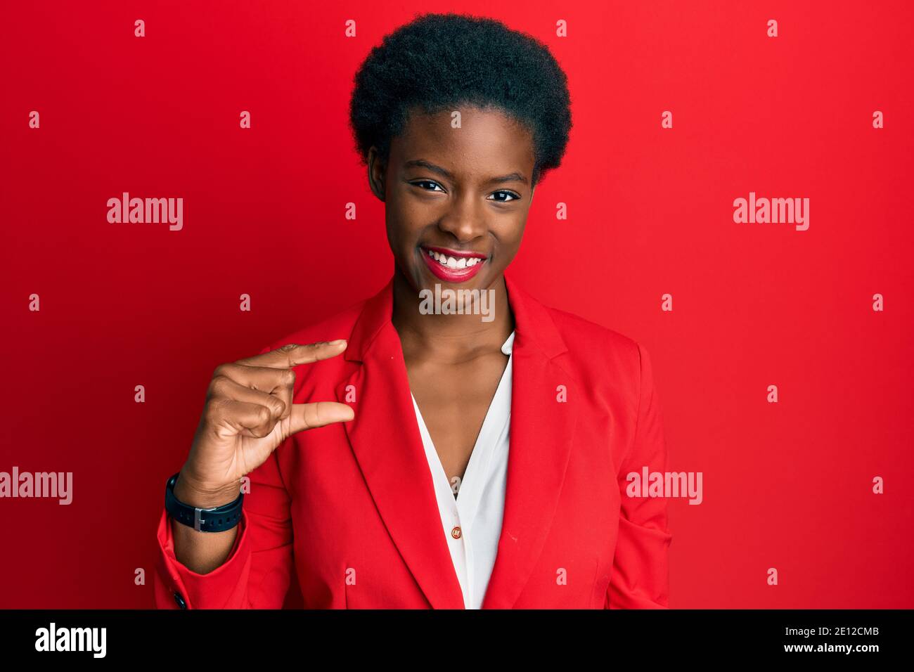 Young african american girl wearing business clothes smiling and ...