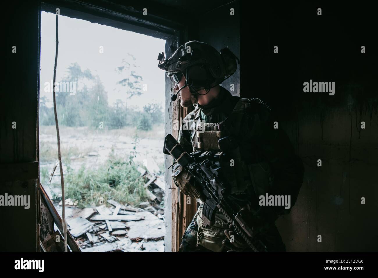 Military men with arms defending the building. Soldier stand guard ...