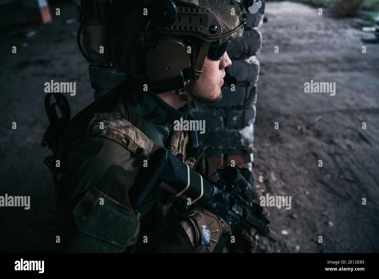 Soldier preparing tactical gear for action battle Stock Photo - Alamy