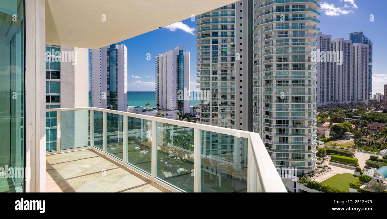Apartment condominium flat balcony with view of coastal buildings nice ...
