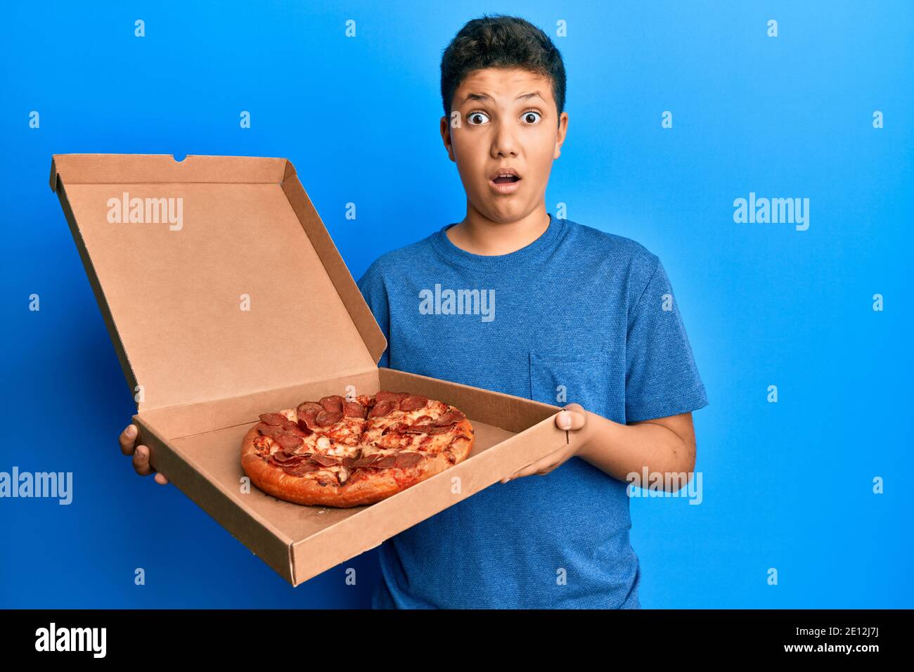 Surprised latin teen boy hi-res stock photography and images - Alamy