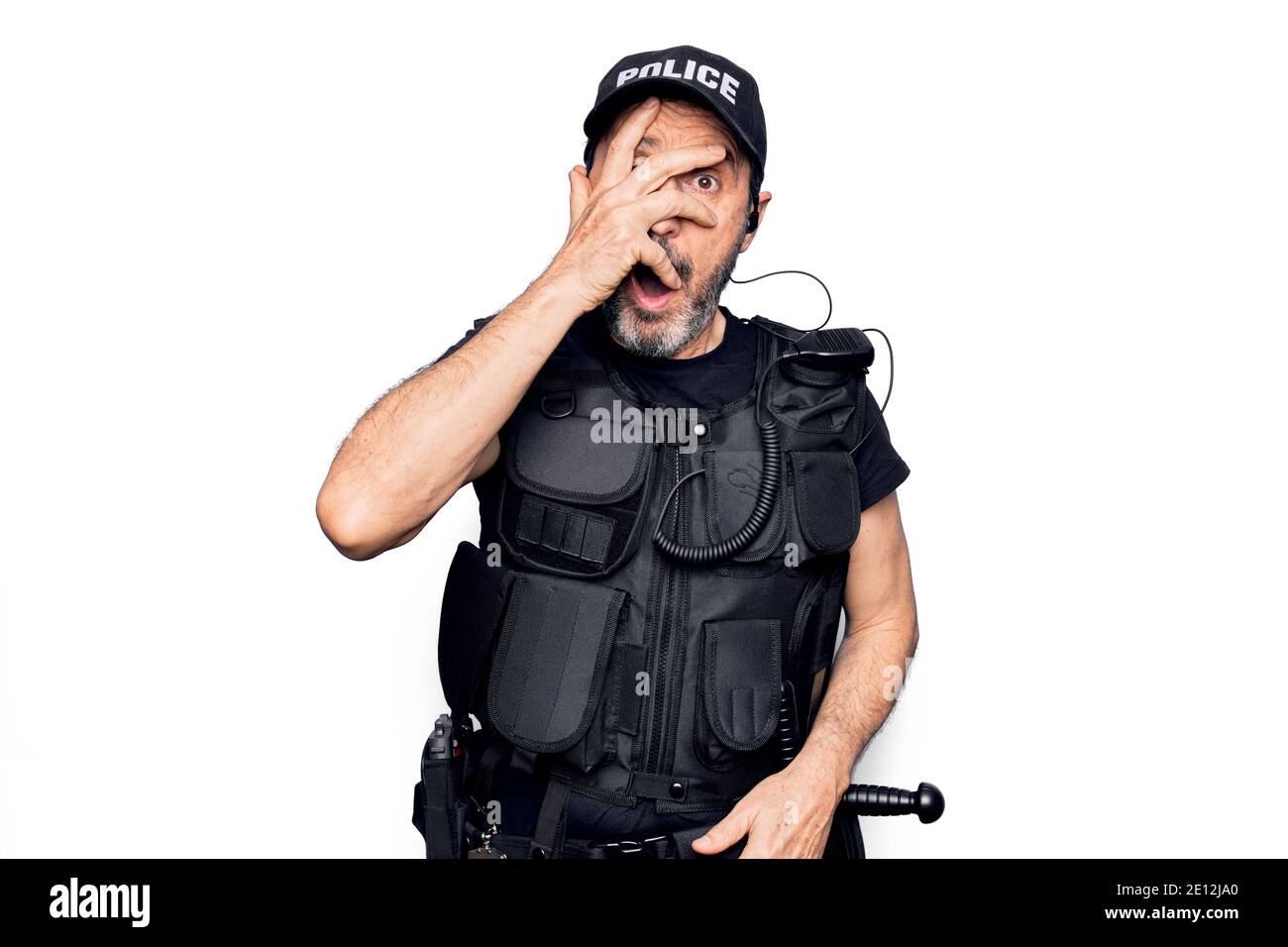 Middle age policeman wearing police uniform and bulletproof vest over ...