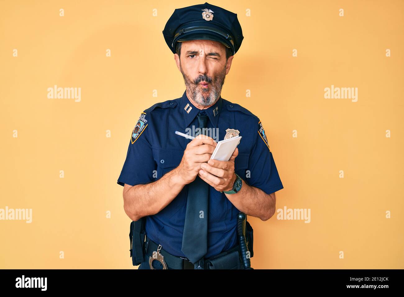 Hispanic police officer ticket hi-res stock photography and images - Alamy