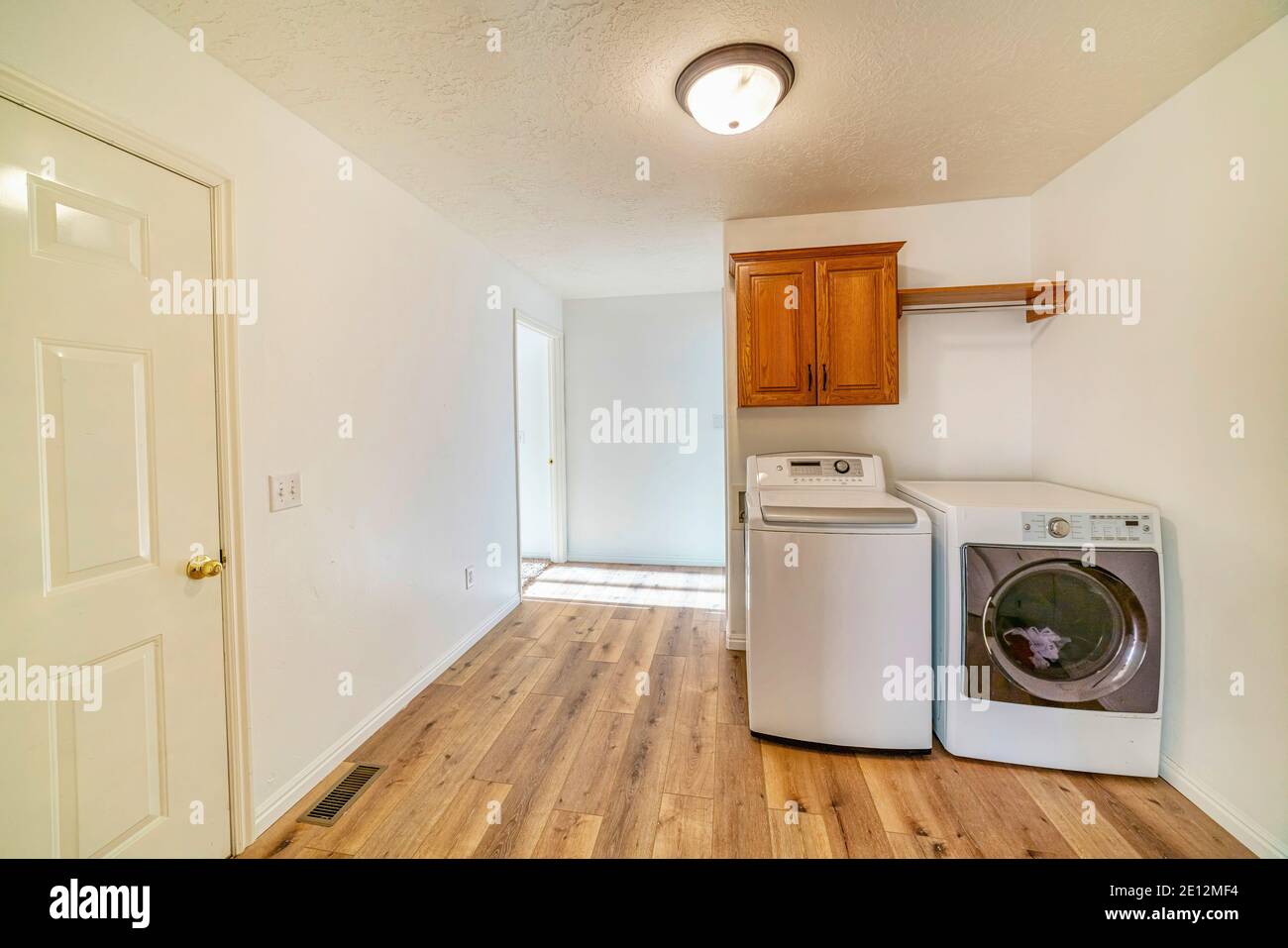 Space washing machine wooden cabinet hi-res stock photography and ...