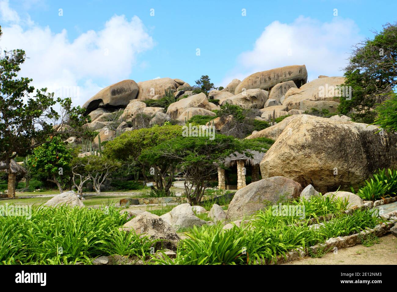 The view of green trees and large stones at Ayo Rock Formations in ...