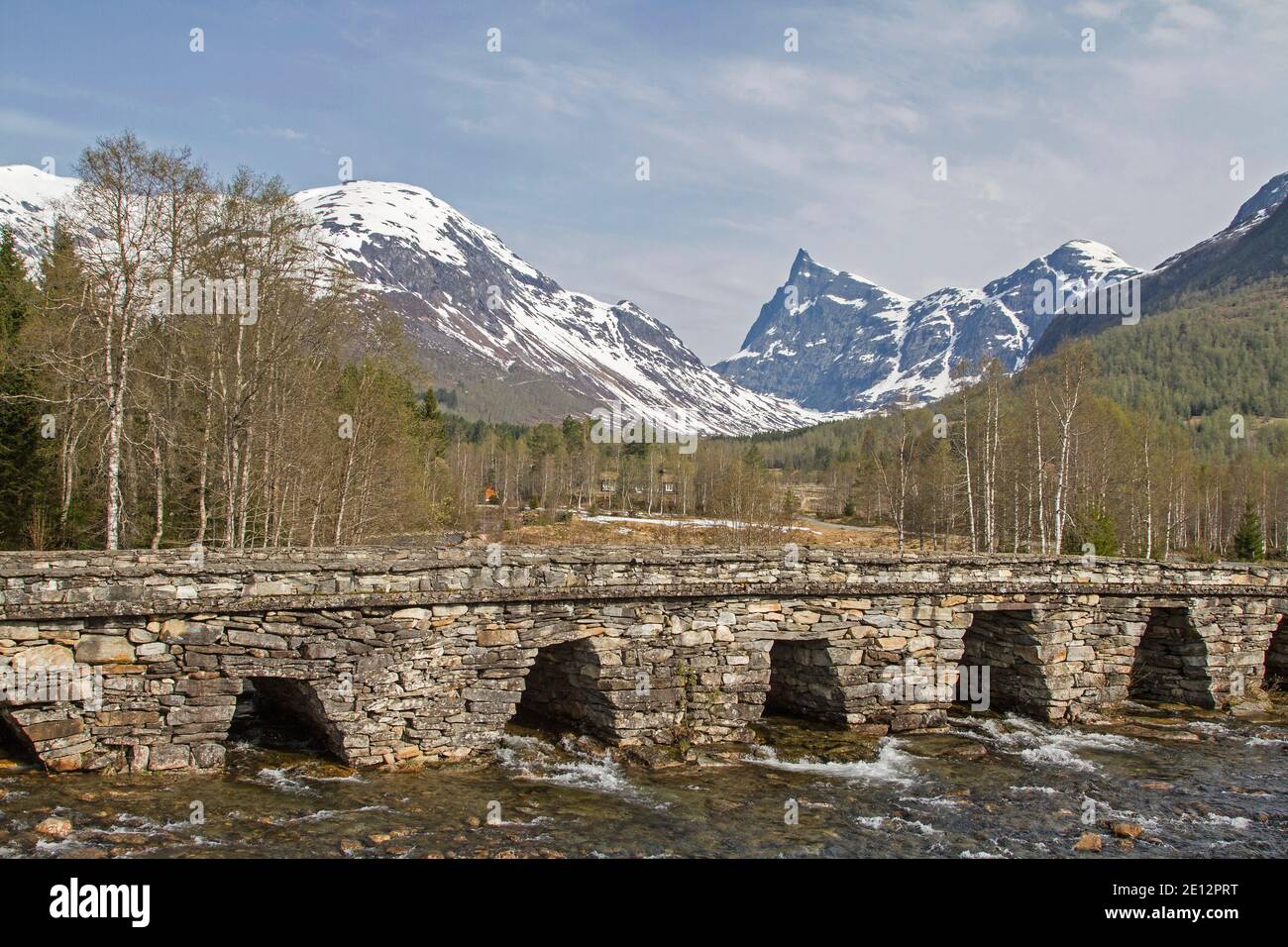 The Hornindal Bridge Is A Stone Arch Bridge That Leads Over The River ...