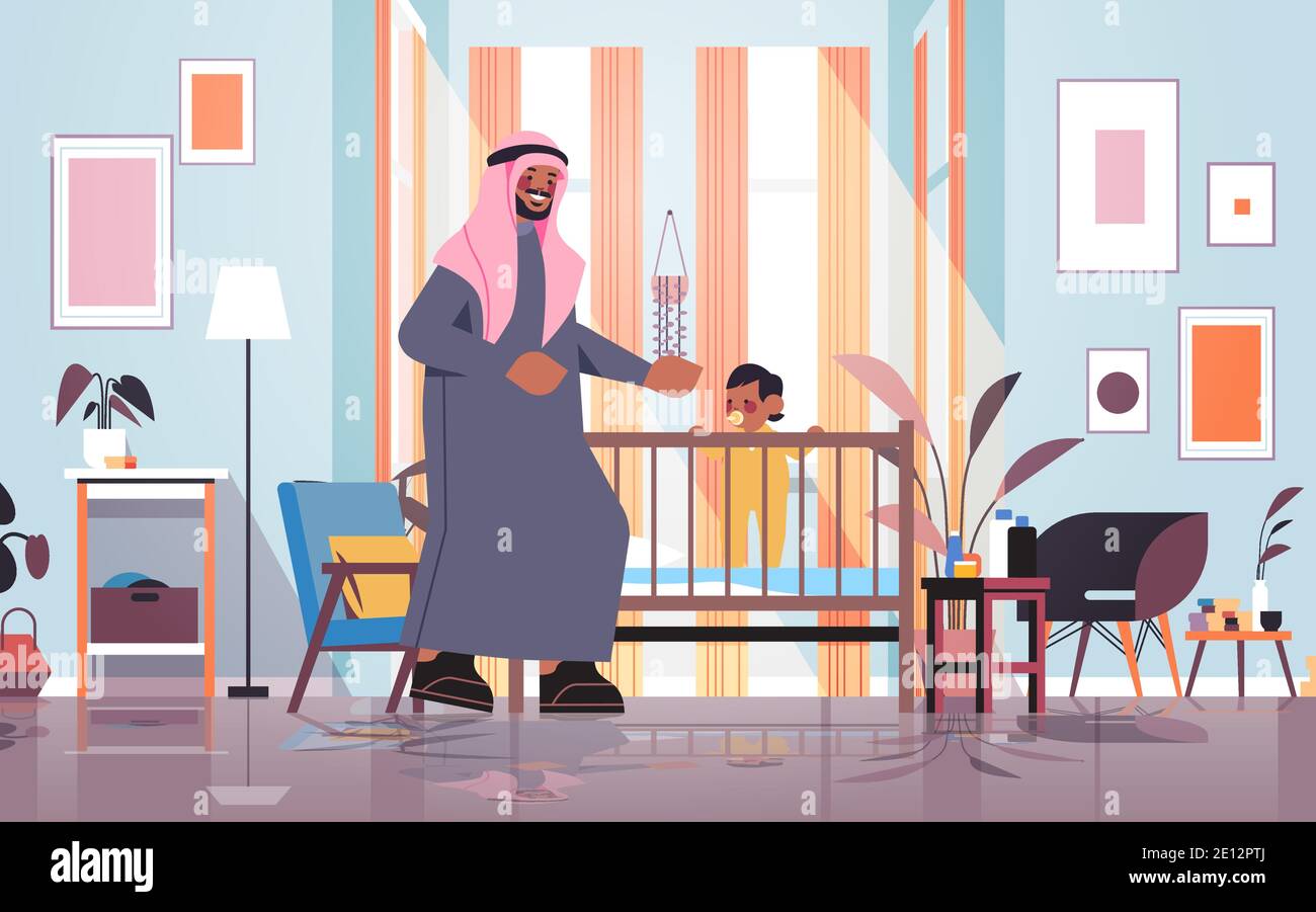 arab father playing with little son in crib fatherhood parenting ...