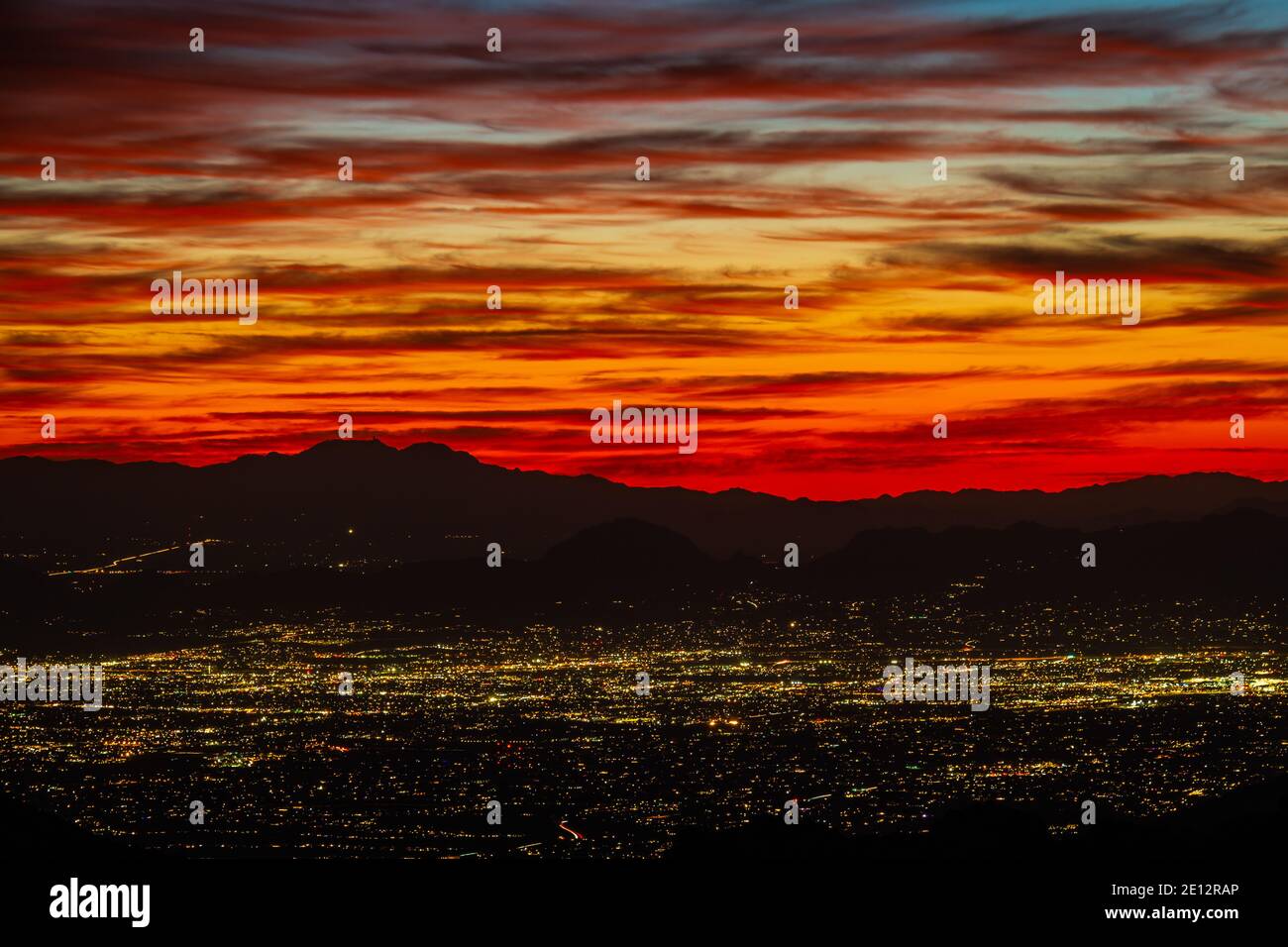 Tucson Arizona as seen from above with the colors of sunset in the ...