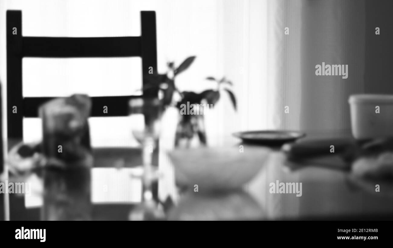 Out Of Focus Of A Dinning Room With Table And Chairs Stock Photo - Alamy