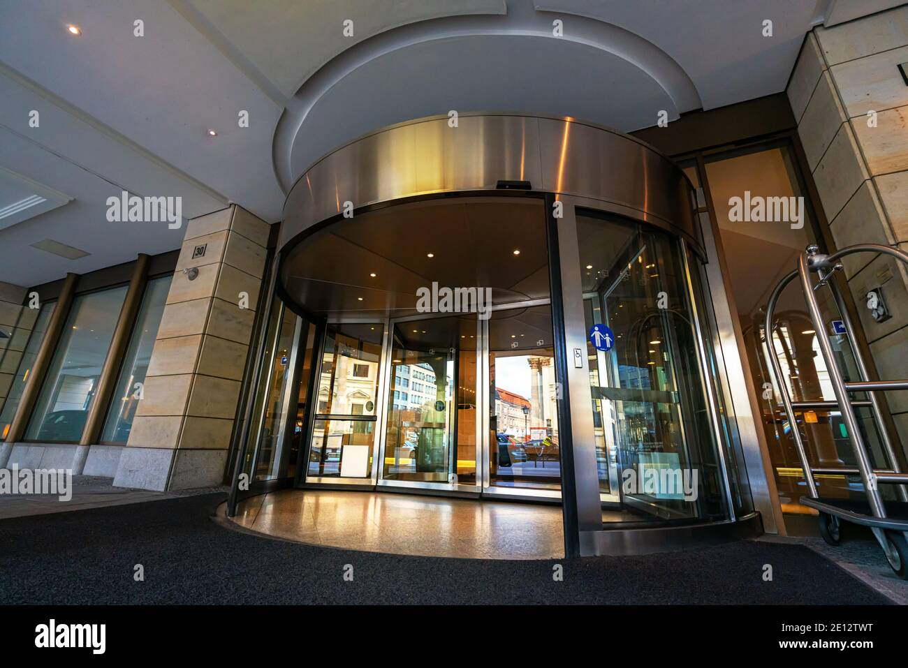 Revolving Door At The Entrance Stock Photo - Alamy