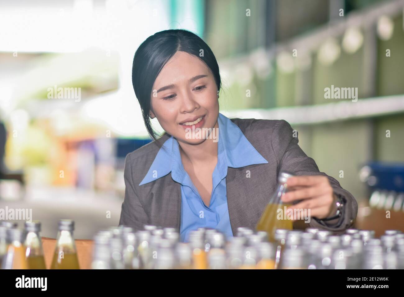 Asian women business working in beverage product factory Stock Photo ...