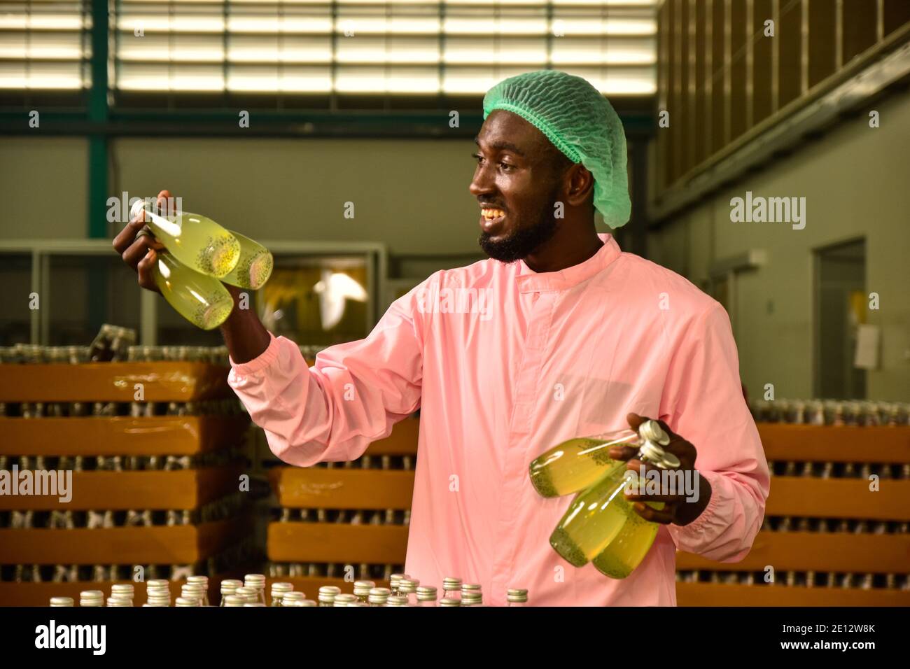 Workers checking product in Export warehouse, Man check beverage ...