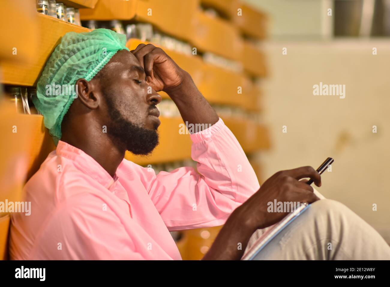 African American worker checking product in Export warehouse, Man check ...