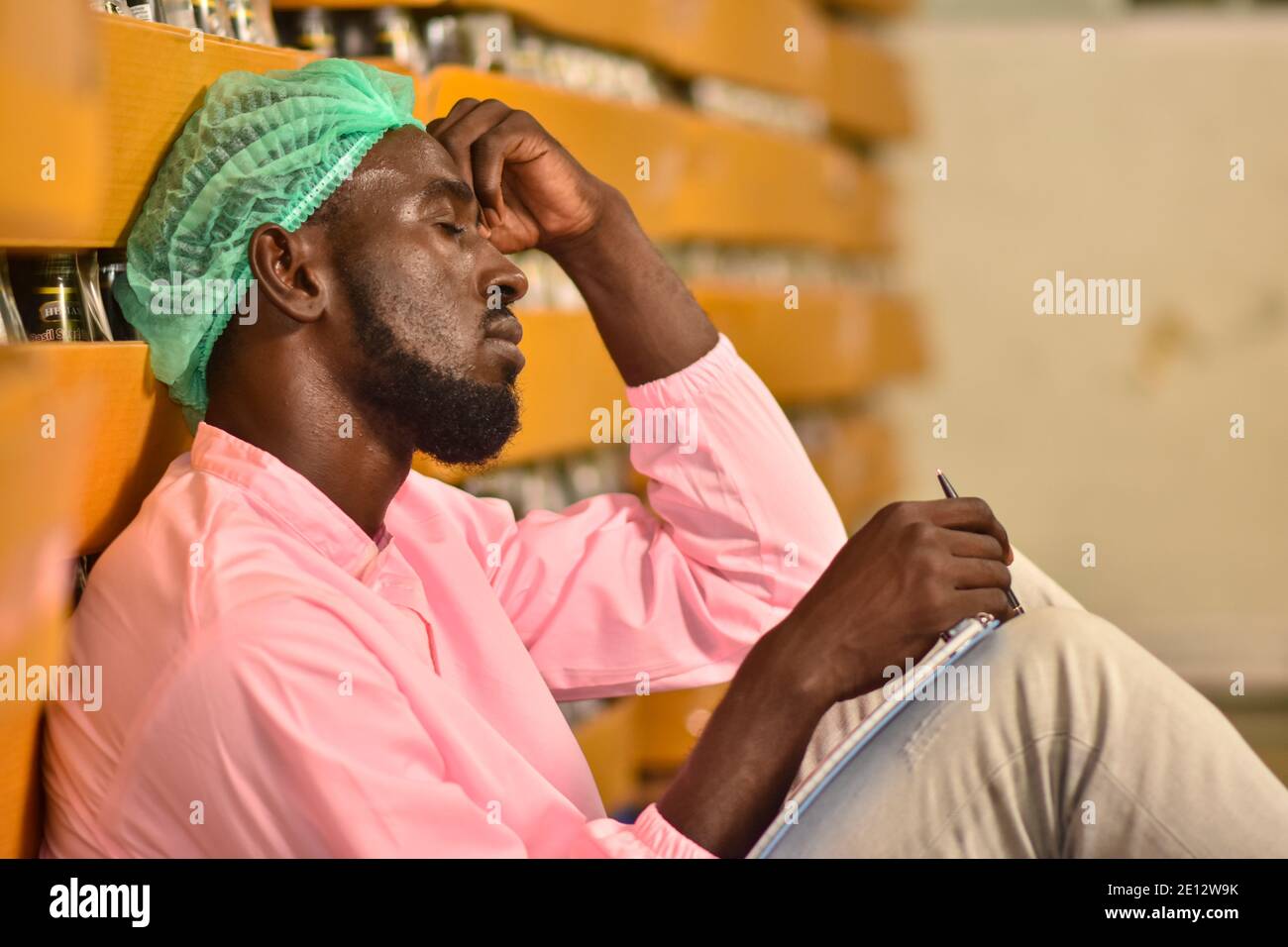 African American worker checking product in Export warehouse, Man check ...