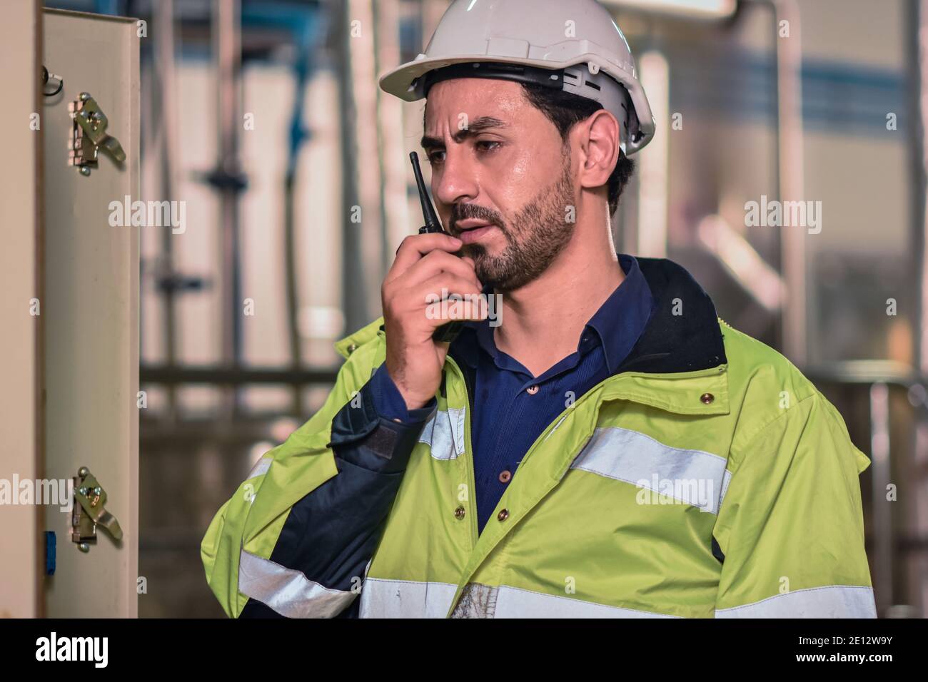 Engineers are using radio communication To coordinate with the team in ...