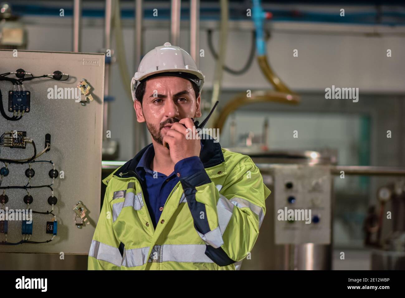 Engineers are using radio communication To coordinate with the team in ...