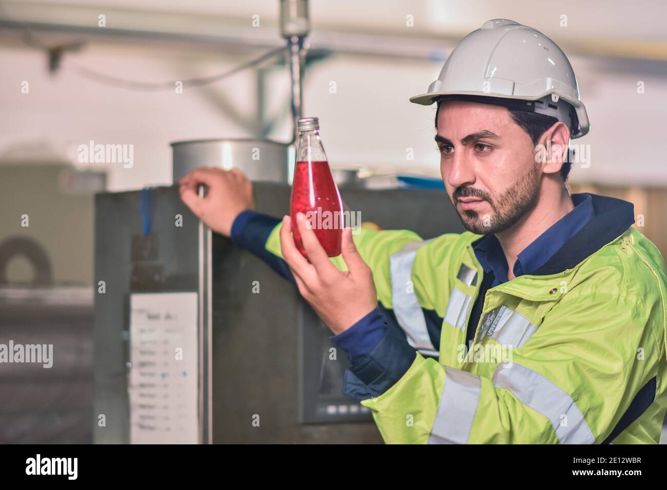 Industrial machine operator checking on hi-res stock photography and ...