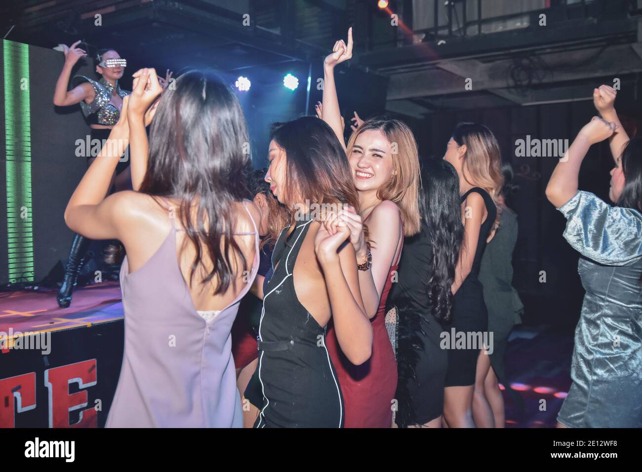 Group people Asian women dancing in night party, Happy new year party ...