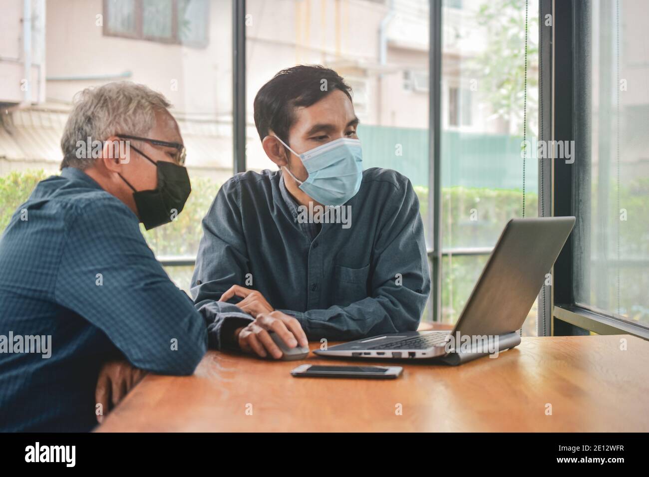 People Talking Face To Face At Work