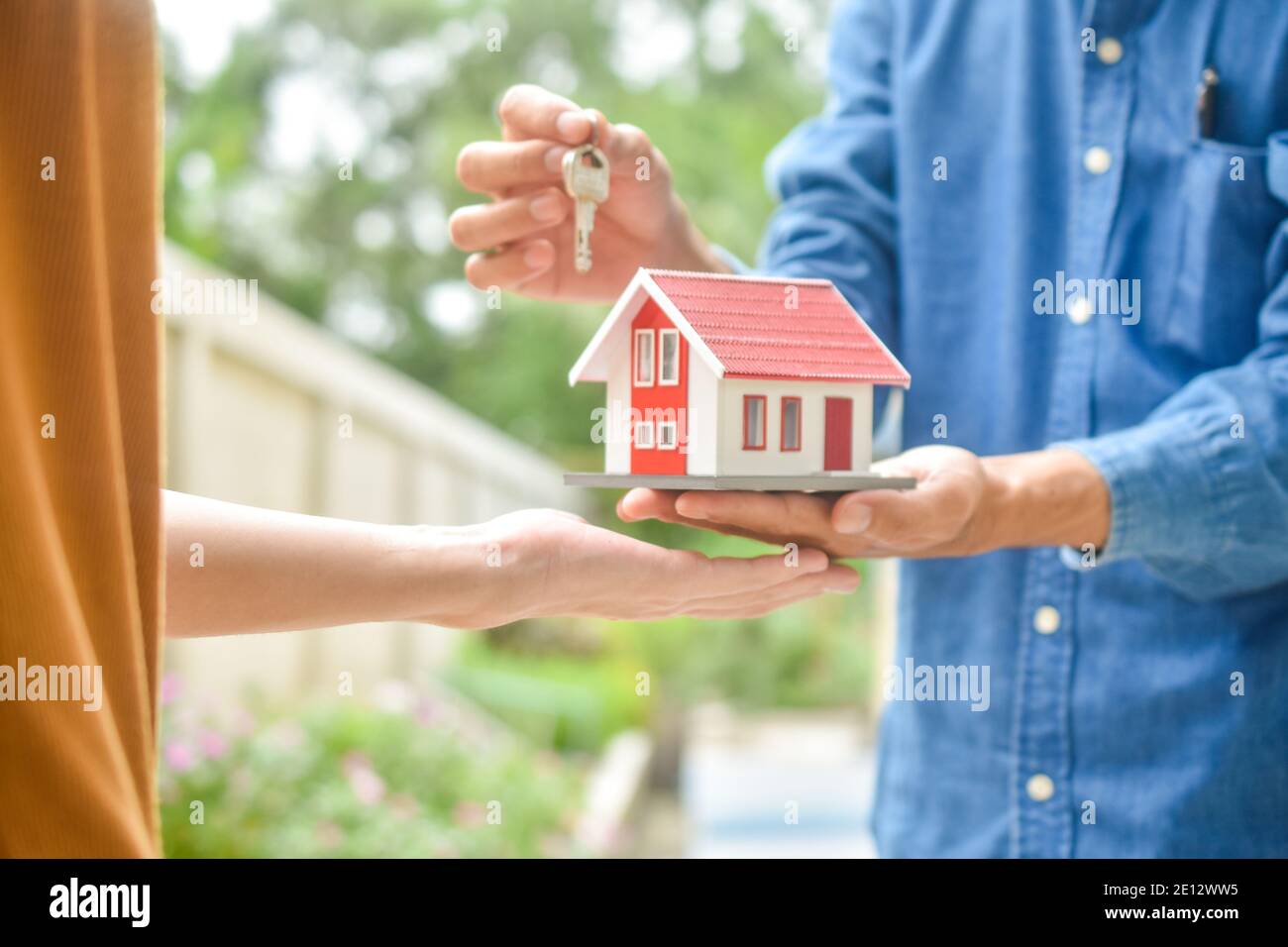Salesman giving key house for customer rent buy real estate business ...