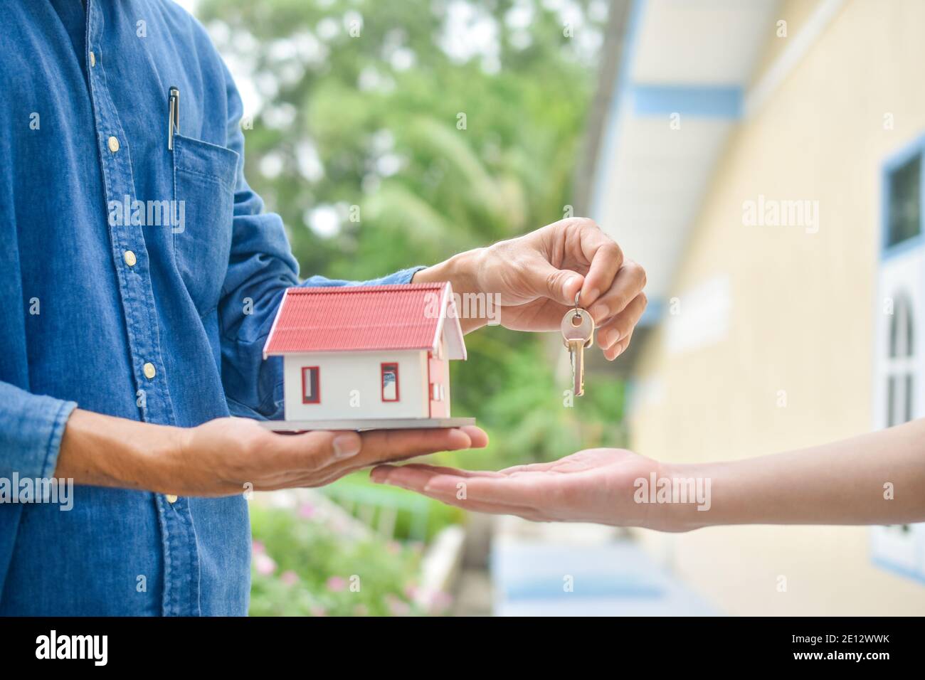 Salesman giving key house for customer rent buy real estate business ...