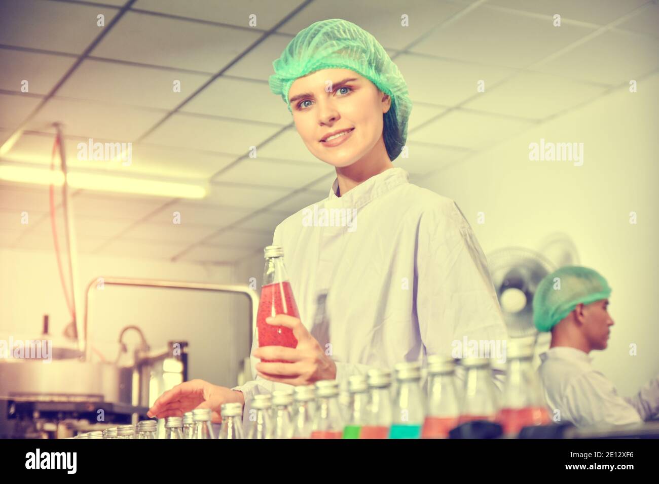 Women inspection quality control in beverage factory Stock Photo - Alamy