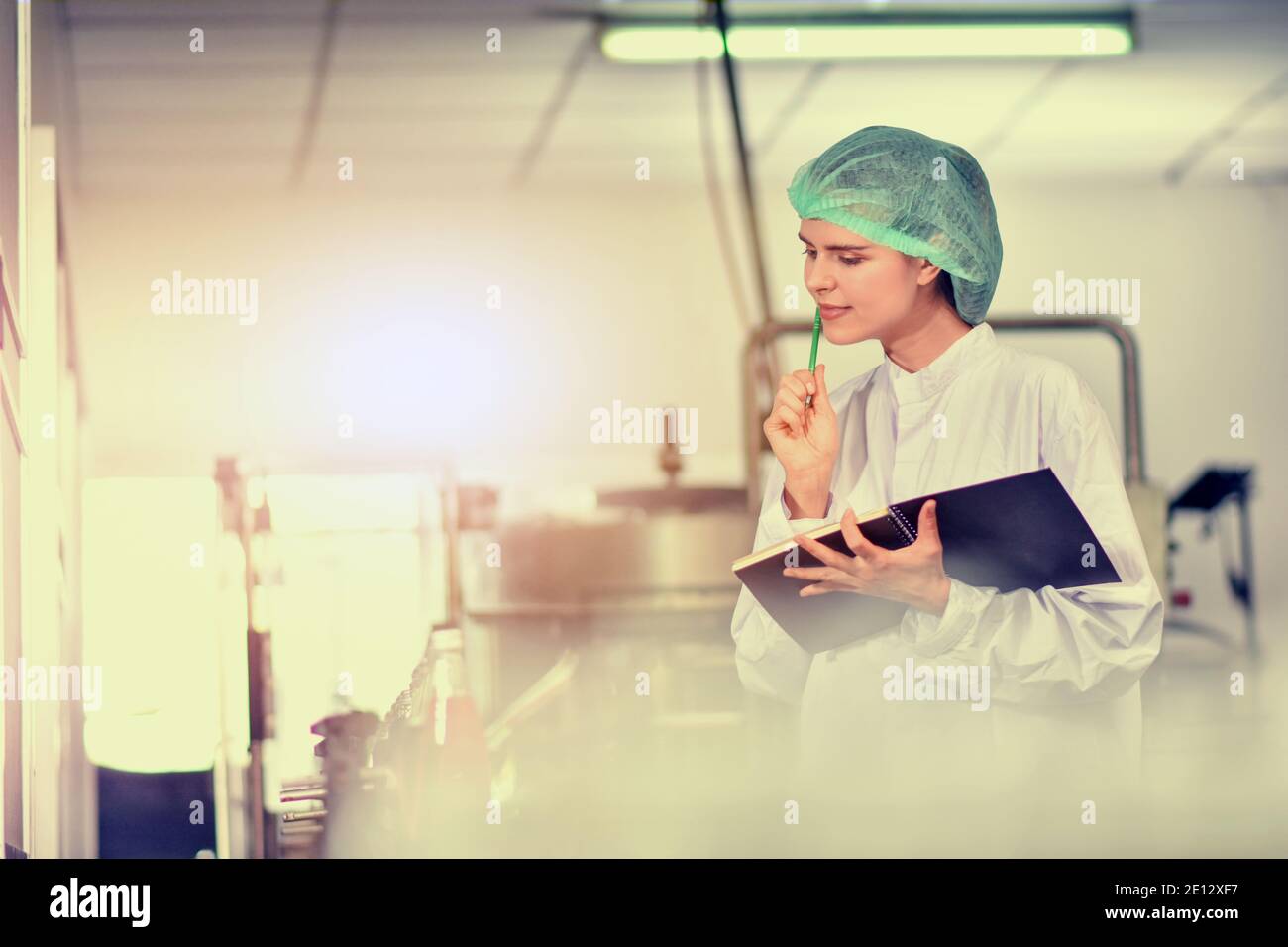 Women inspection quality control in beverage factory Stock Photo - Alamy