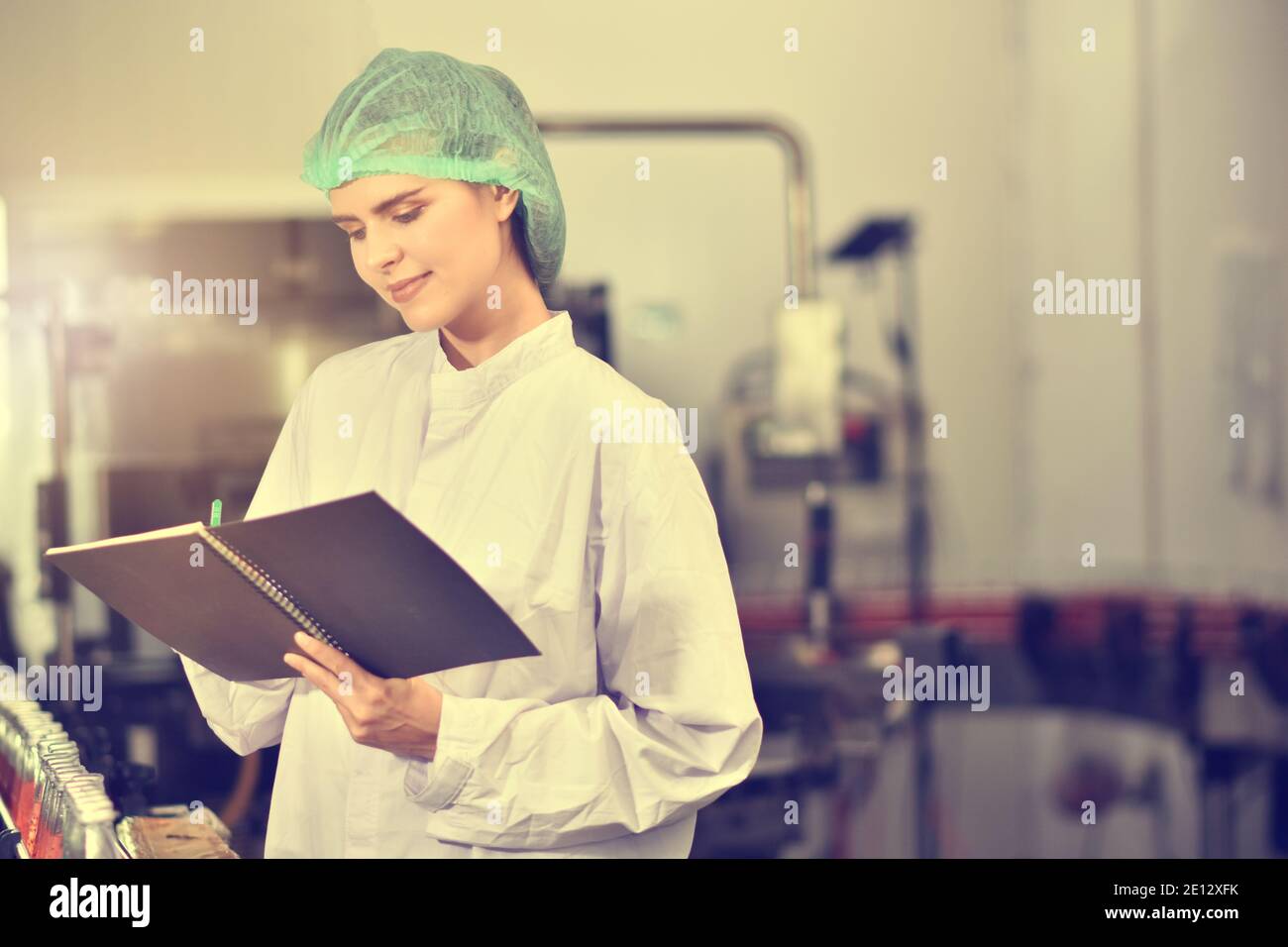 Women inspection quality control in beverage factory Stock Photo - Alamy