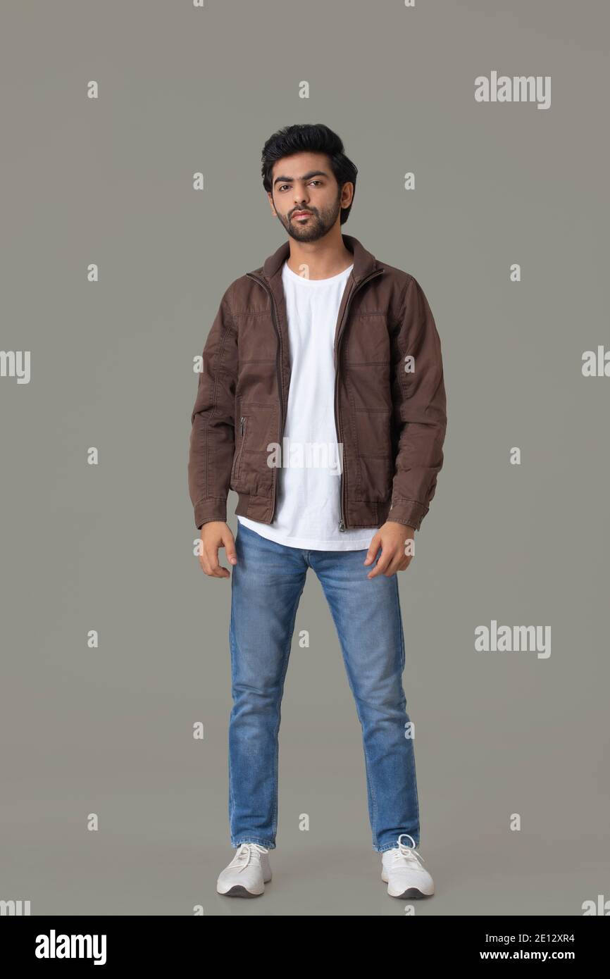 Young fashion man standing hi-res stock photography and images - Alamy