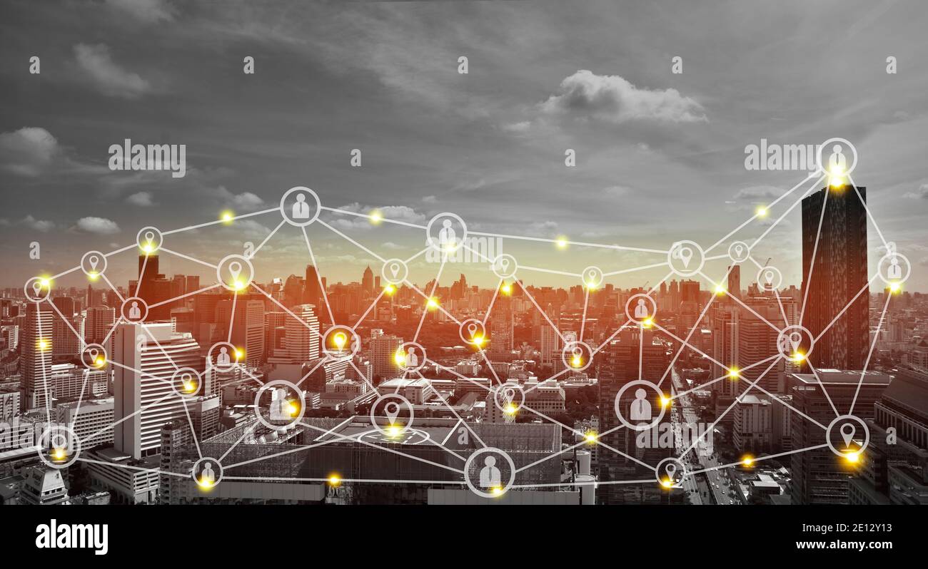 Network technology on sky in city Stock Photo - Alamy