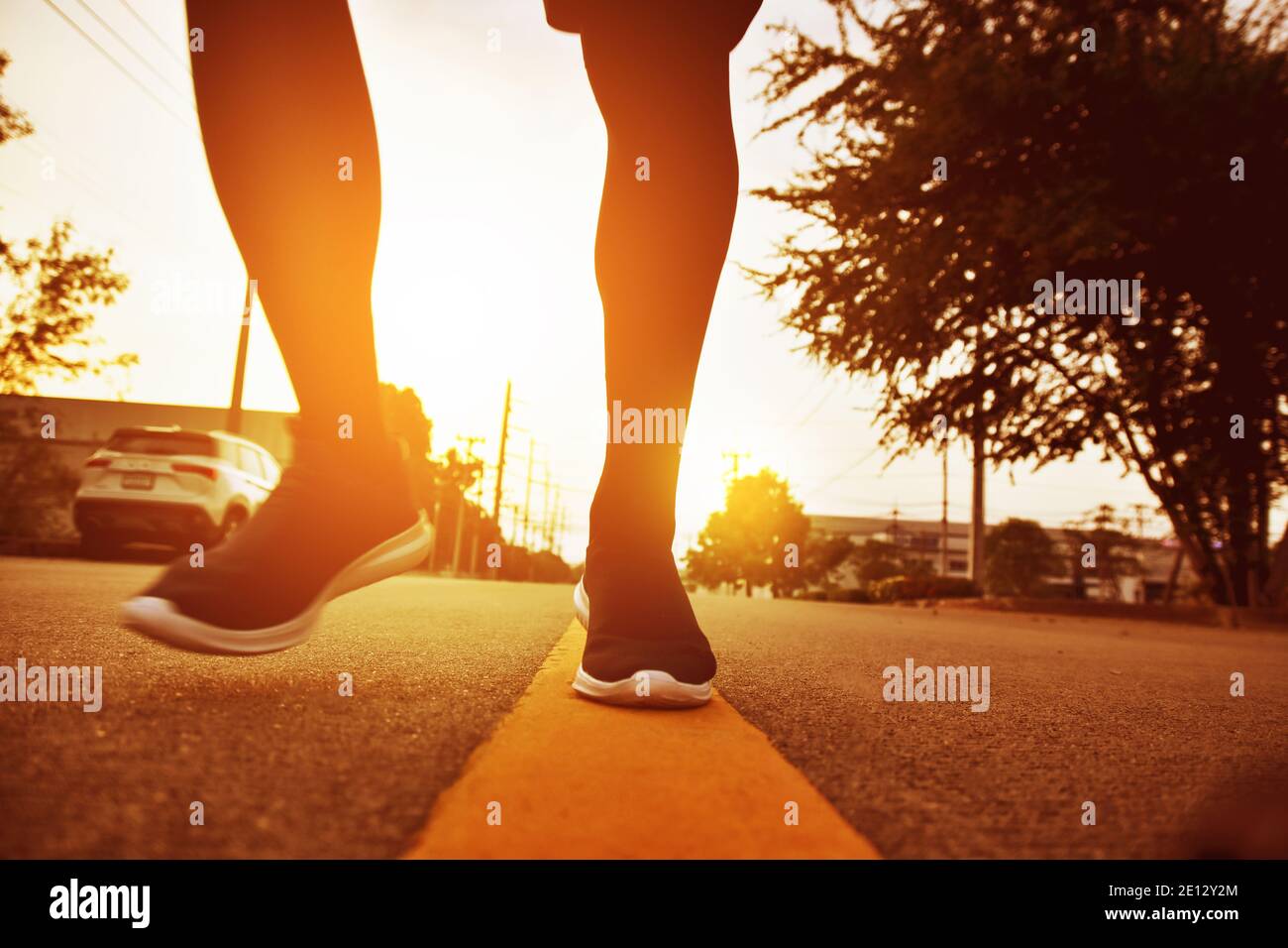 Man running on road hi-res stock photography and images - Alamy