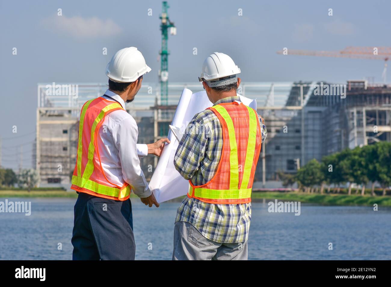 Two Engineer survey location for project building construction real ...