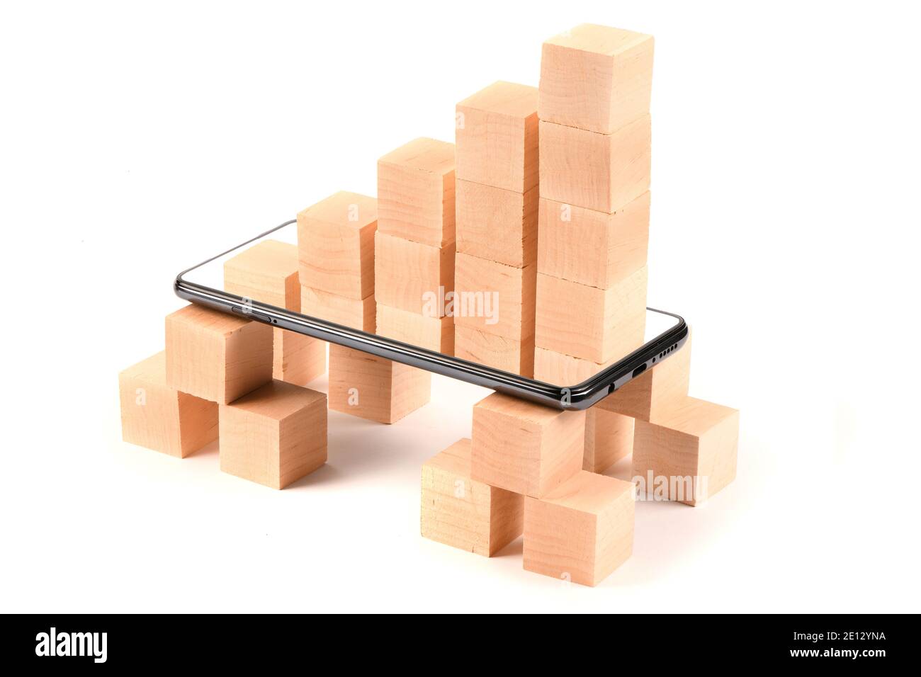 Black mobile smartphone and wooden cubes. Smartphone with blank screen ...