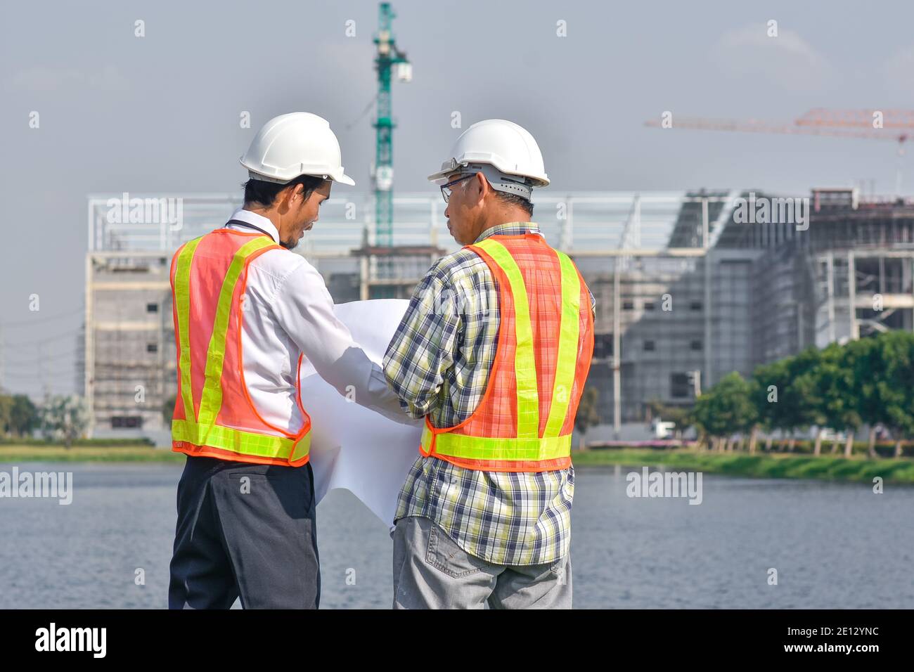 Two Engineer survey location for project building construction real ...