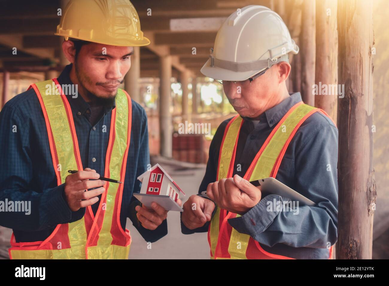 Two Engineer inspection on site building construction to control ...