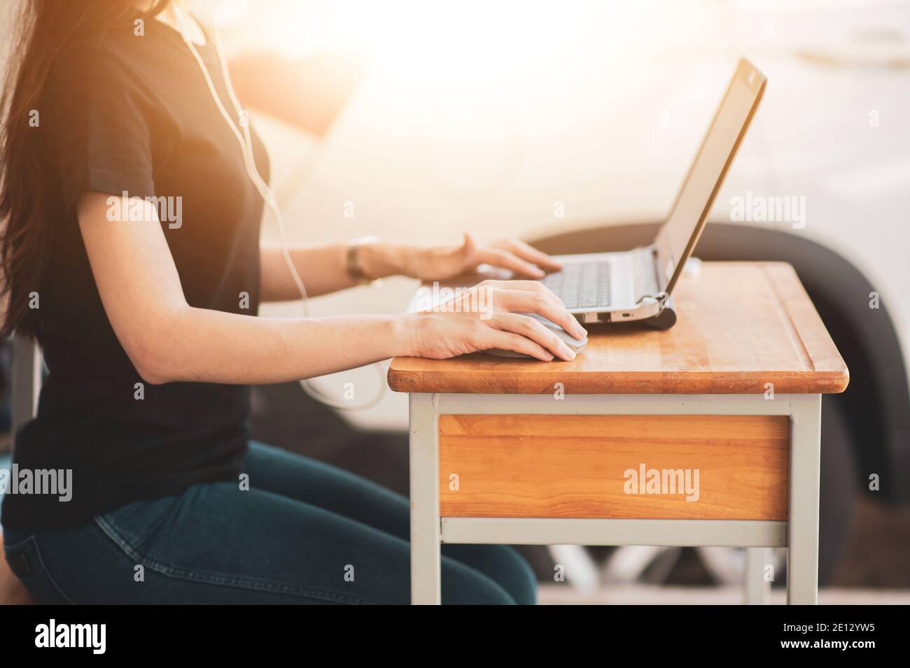 Asian women using computer shopping online and working at home Stock ...