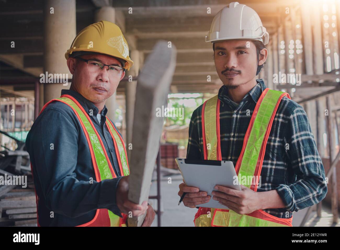 Two Engineer inspection on site building construction to control ...