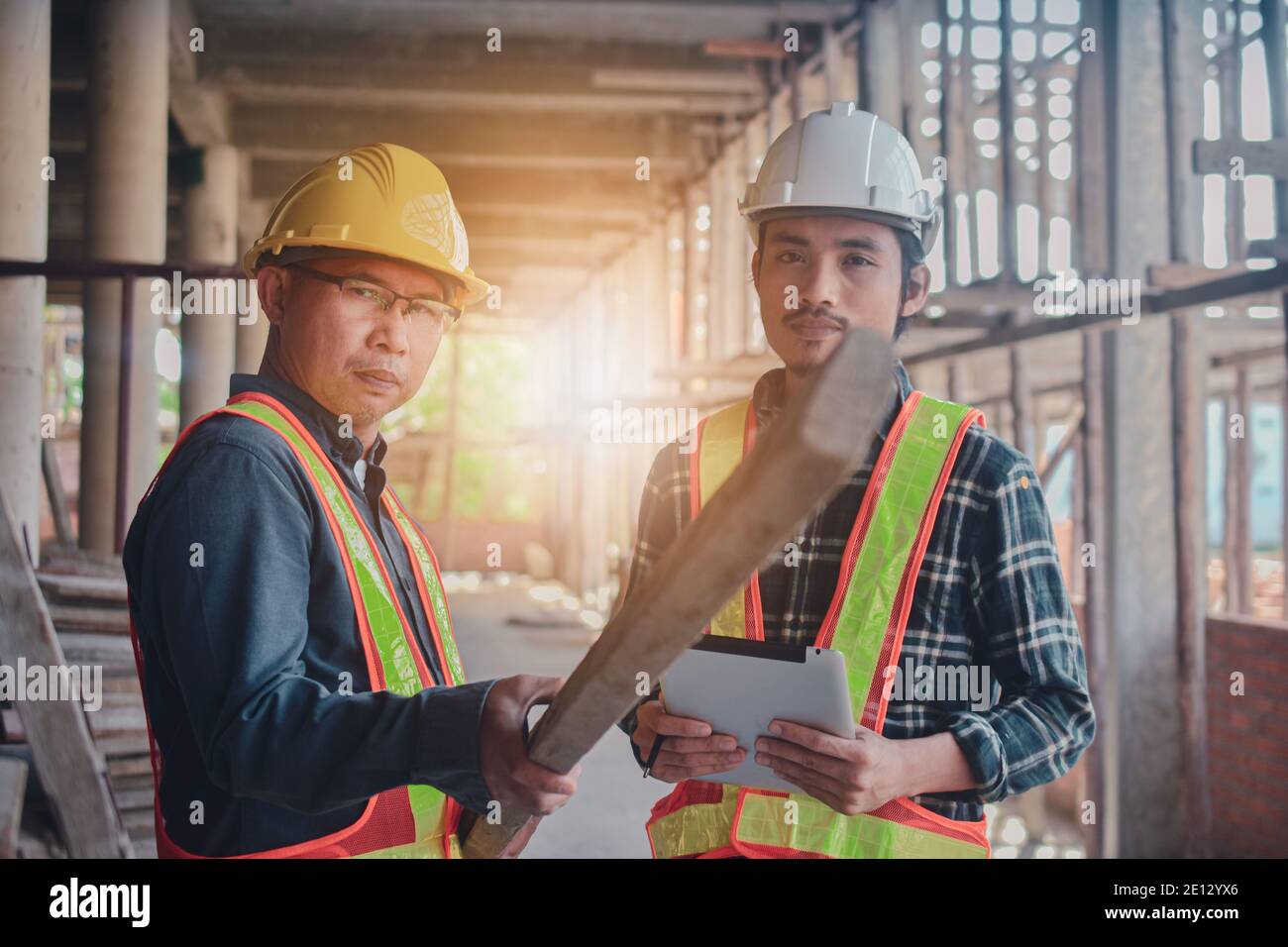 Two Engineer inspection on site building construction to control ...