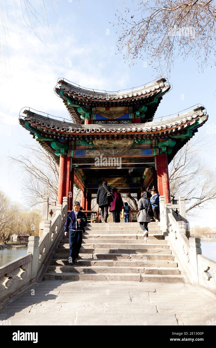 Beijing, China Bridge of Pastoral Poems and visitors at the Summer ...